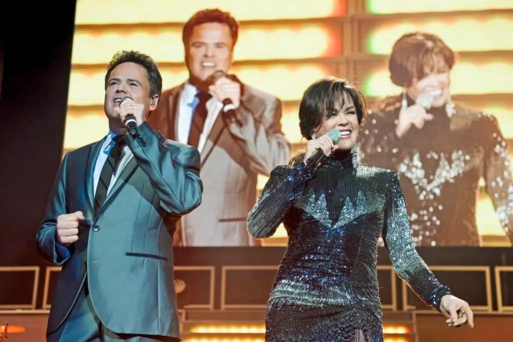 Donny Osmond en Marie Osmond treden op tijdens een concert in de O2 Arena op 20 januari 2013 in Londen, Engeland