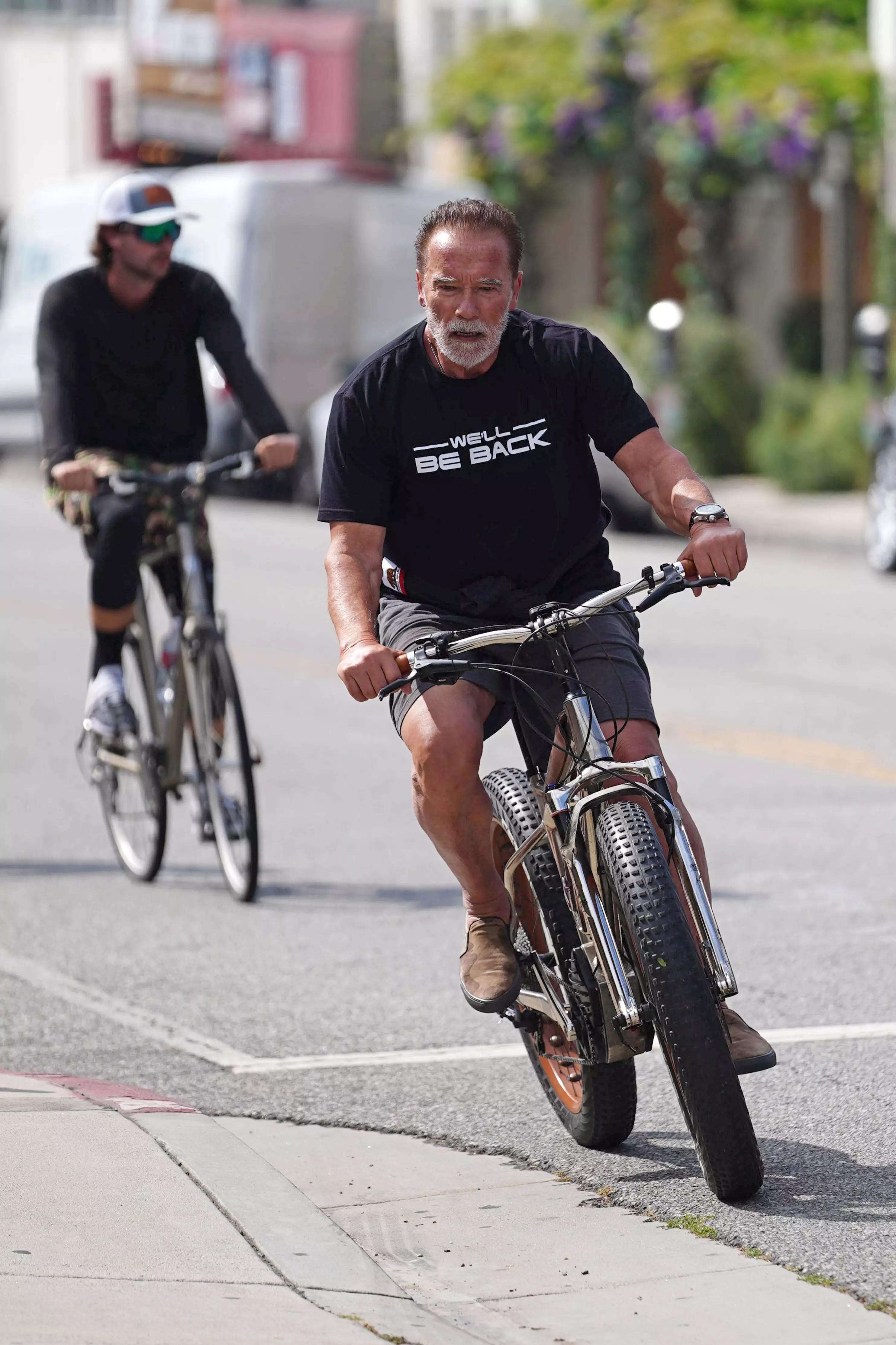 arnold-schwarzenegger-and-son-patrick-go-on-a-bike-ride-photos